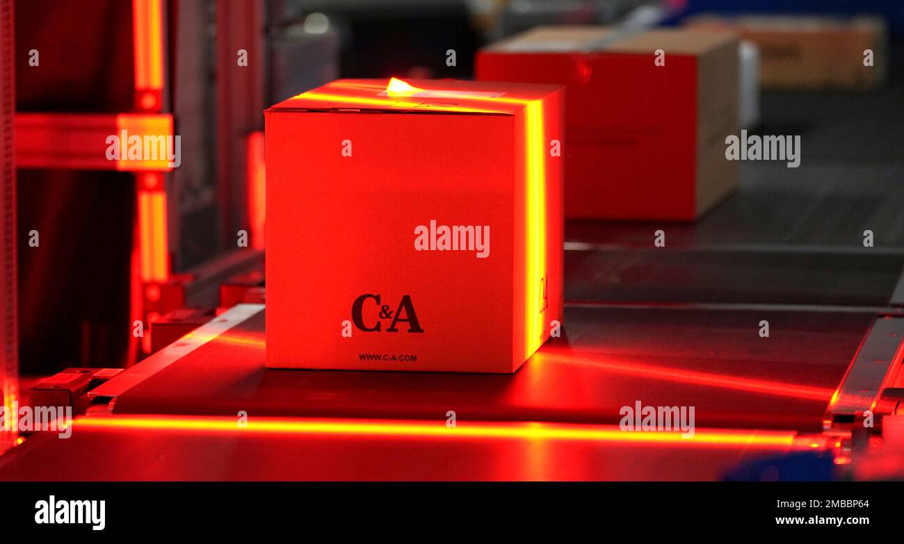 The address label of a parcel is scanned as the parcel is transported ...