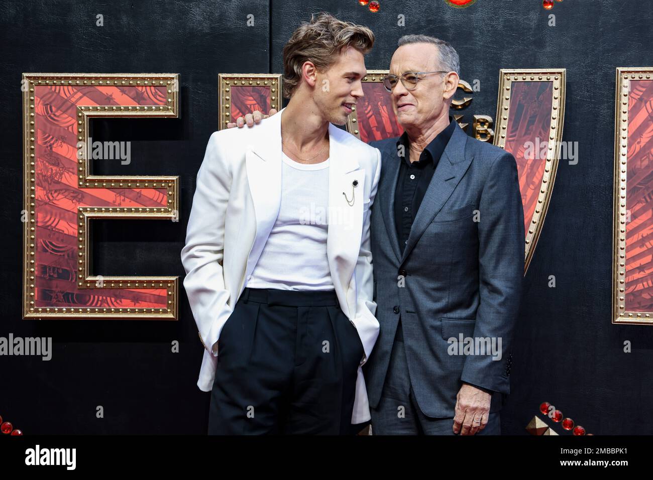 Austin Butler, left, and Tom Hanks pose for photographers upon arrival ...
