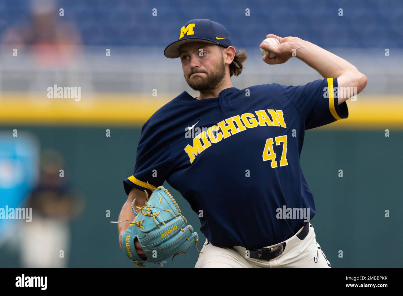 Michigan's Jacob Denner (47) throws against Rutgers in the NCAA college ...