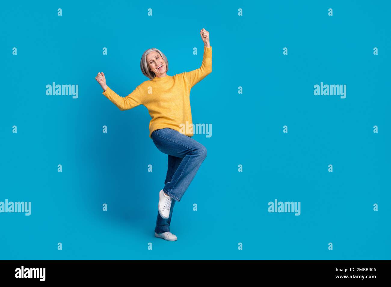 Full body portrait of cheerful overjoyed person raise fists shout yes ...