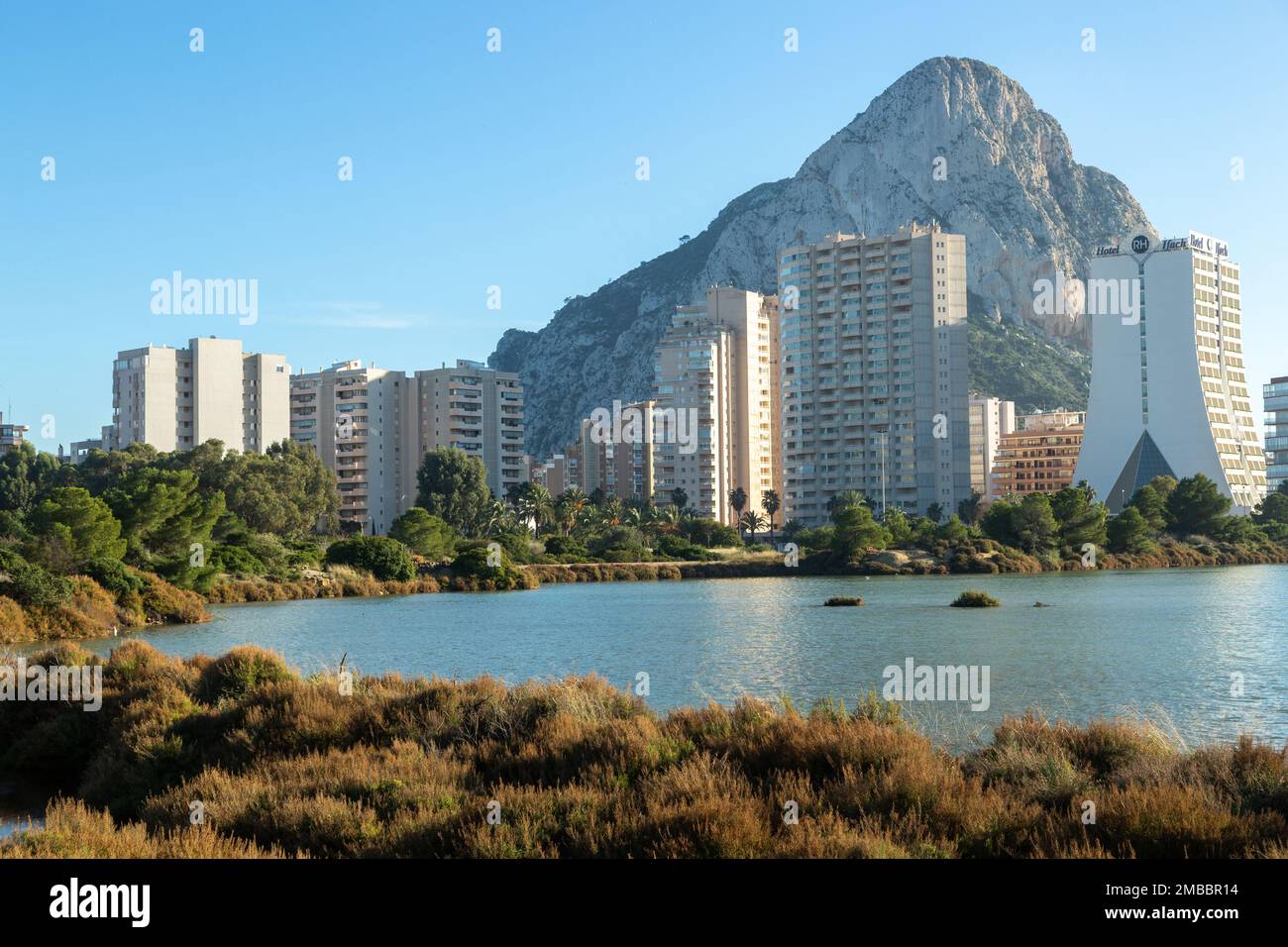 Las Salinas de Calpe with the massive limestone outcrop of Penon de ...