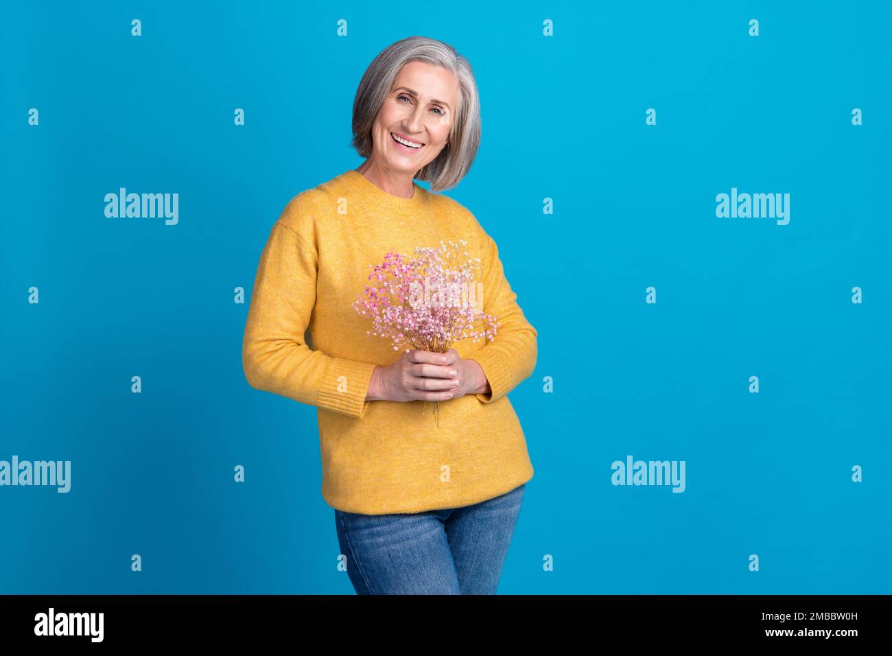 Photo Of Lovely Nice Aged Lady Hands Hold Bouquet Wild Flowers Isolated