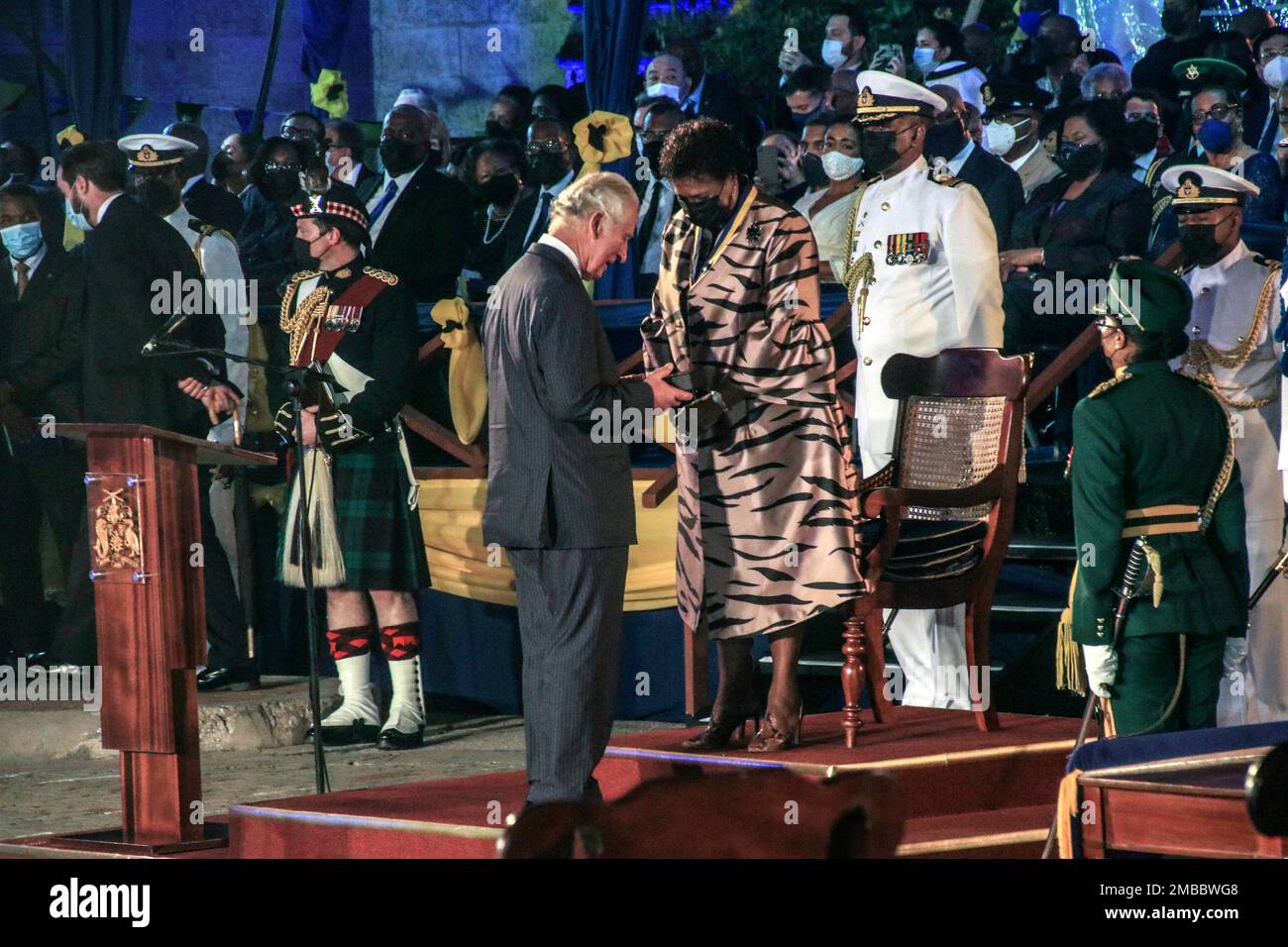 FILE - Barbados' new President Sandra Mason, center right, awards ...