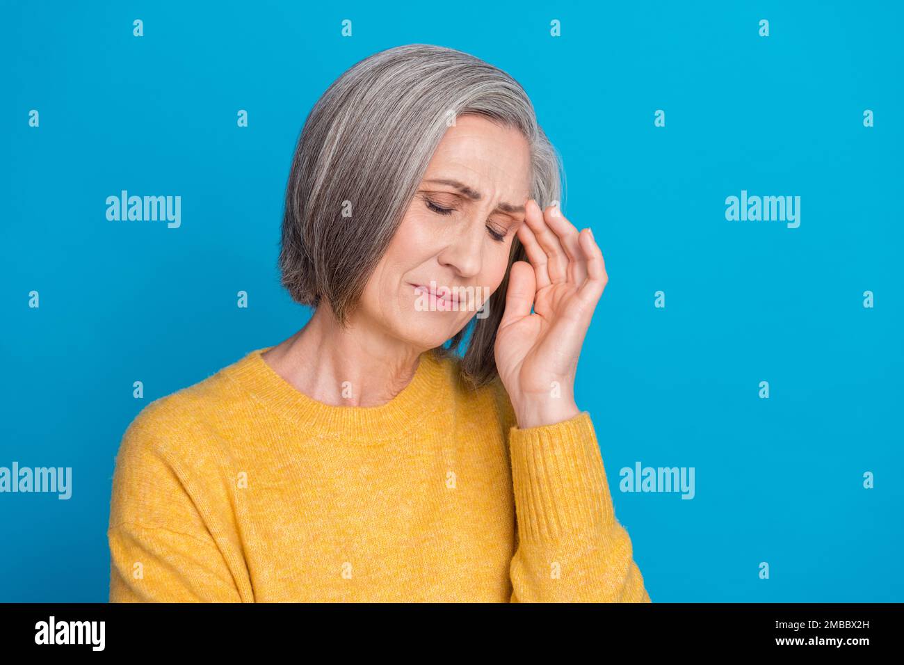 Photo portrait of stunning grandma touch temples suffer head ache feel ...