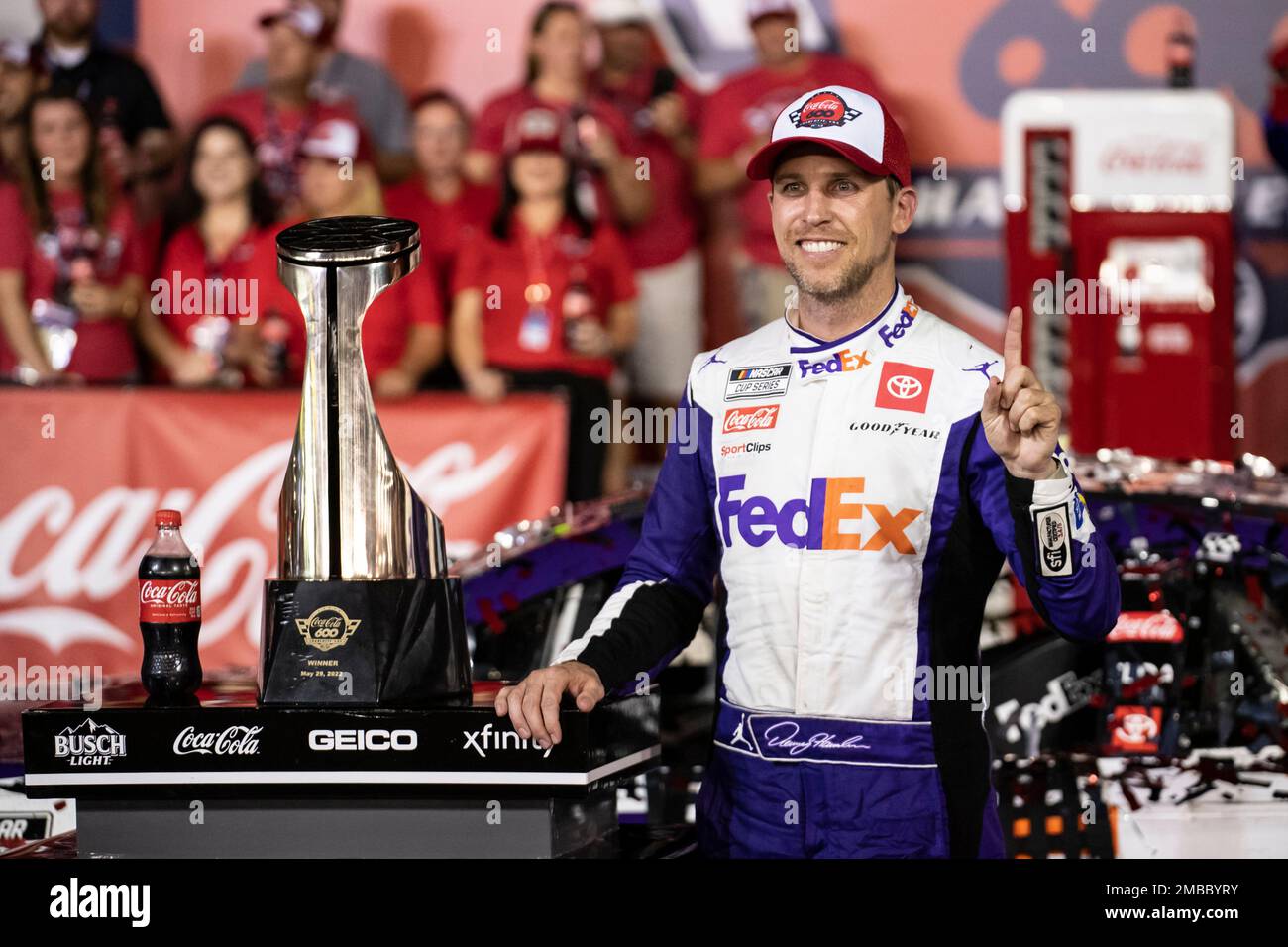 Denny Hamlin smiles in Victory Lane after winning a NASCAR Cup Series ...