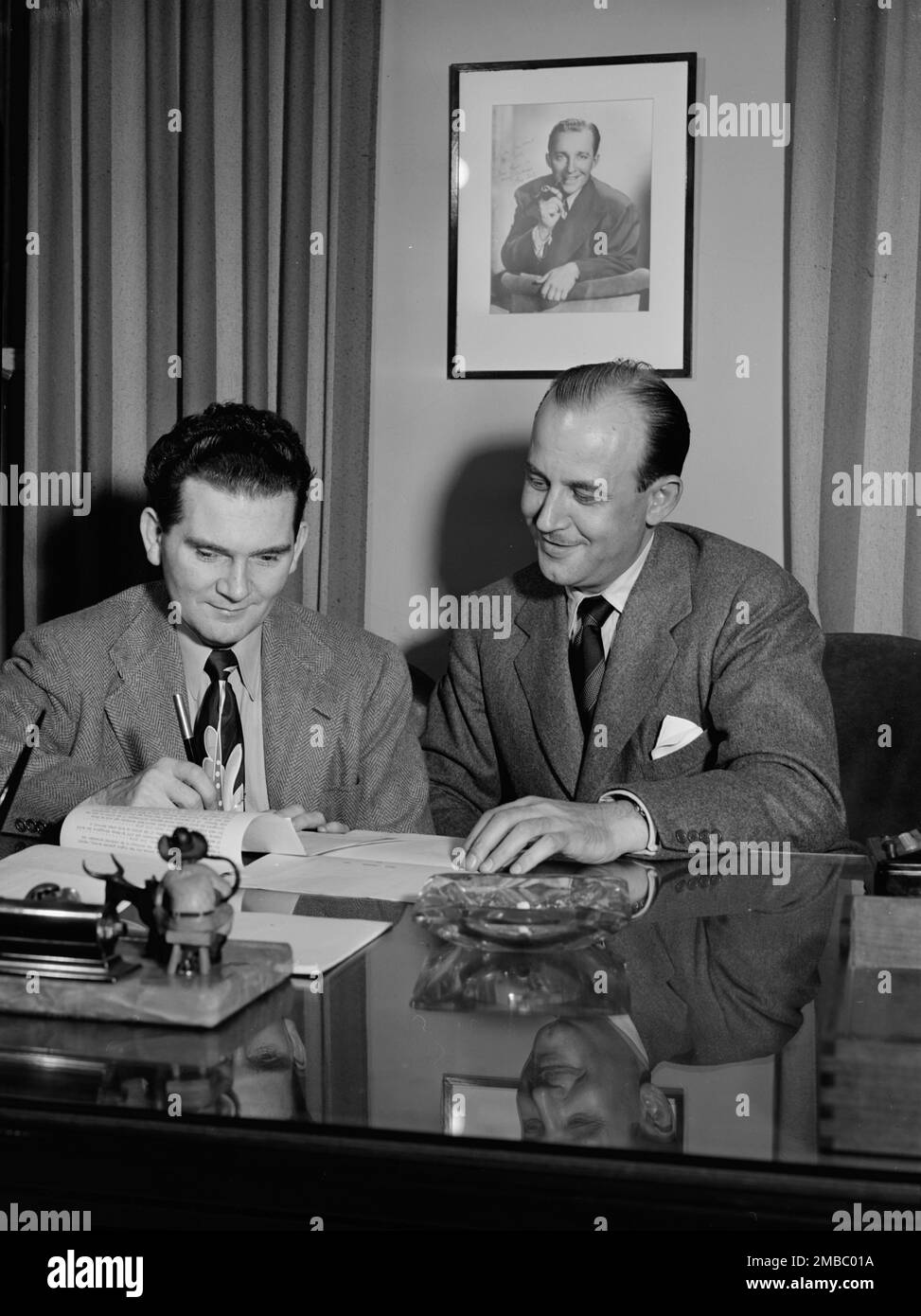 Portrait of Joe Mooney and Milt Gabler(?), Decca office(?), New York, N ...