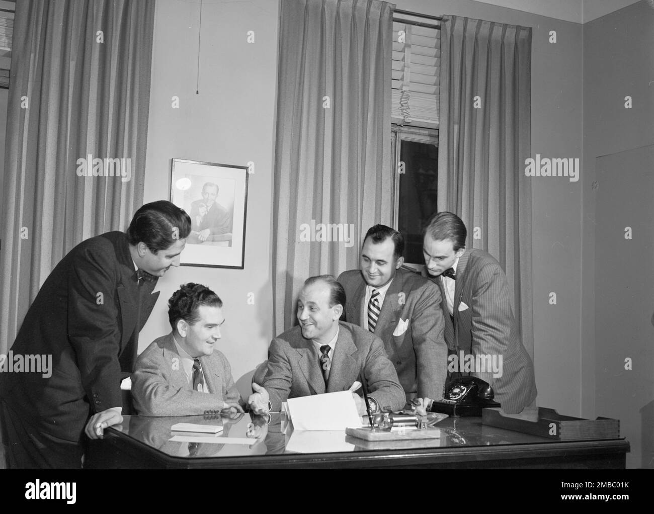 Portrait of Joe Mooney and Milt Gabler(?), Decca office(?), New York, N ...