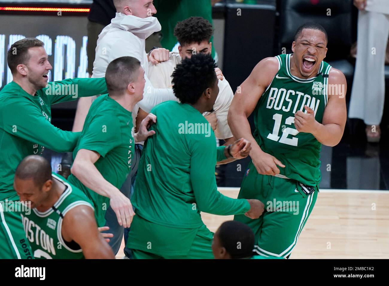 Boston Celtics forward Grant Williams (12) celebrates with his ...