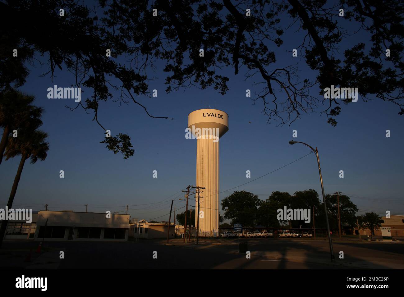 The sun begins to set in the town of Uvalde, Texas Sunday, May 29, 2022 ...