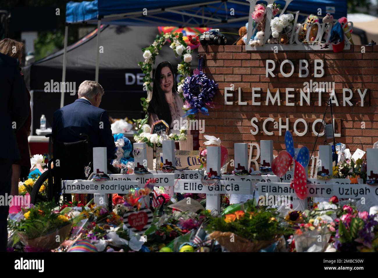 Texas Gov. Greg Abbott visits a memorial at Robb Elementary School in ...