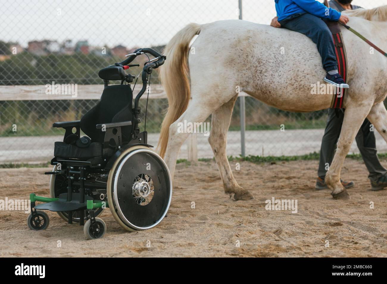Wheelchair parked at an equine therapy center Stock Photo - Alamy