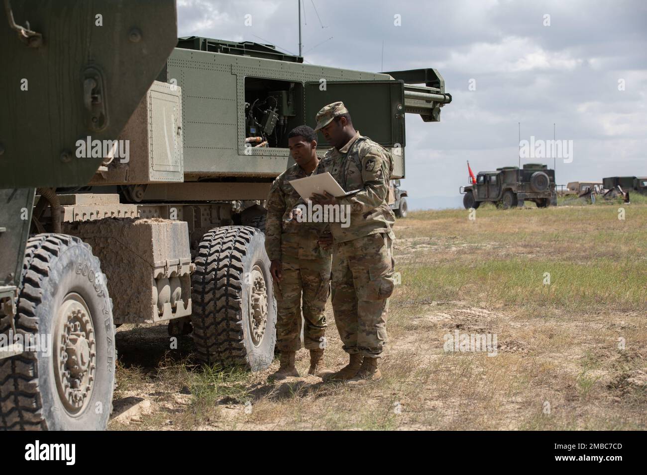 Spc. Joseph Reed and Pfc. Ashton Pree, both launch rocket system ...