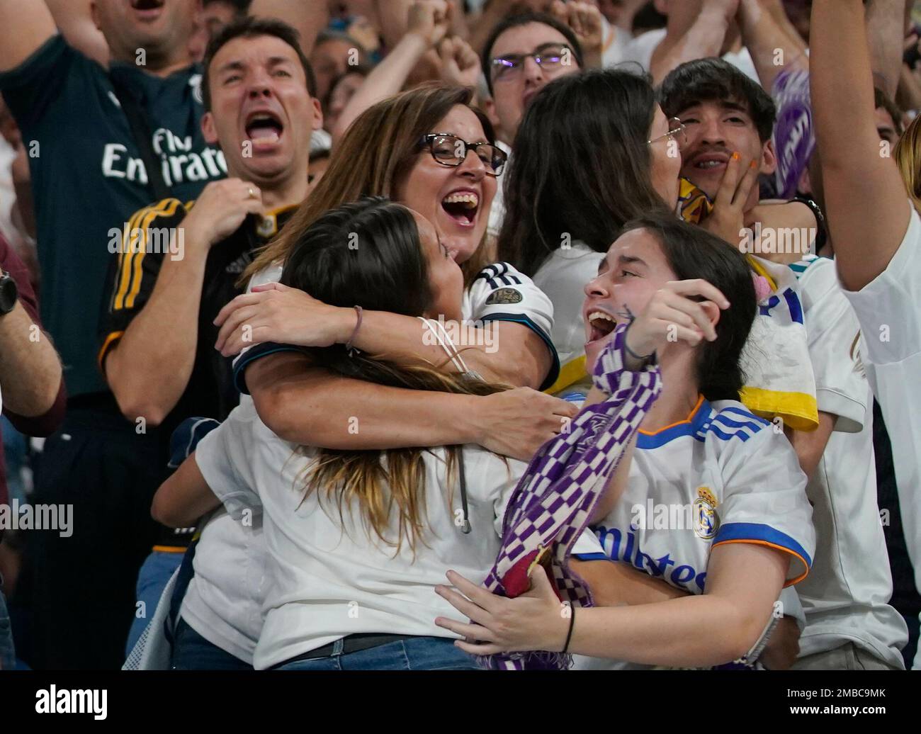 Real Madrid supporters celebrate a goal while watching the Champions ...
