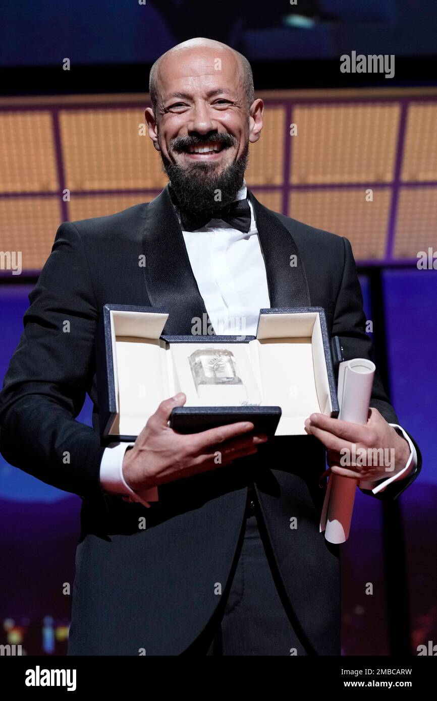 Writer/director Tarik Saleh accepts the award for best screenplay for ...