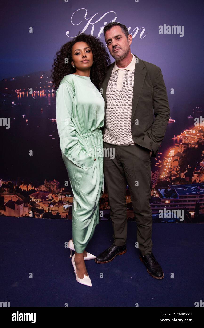 Kat Graham and Darren Genet pose for photographers upon arrival at the ...