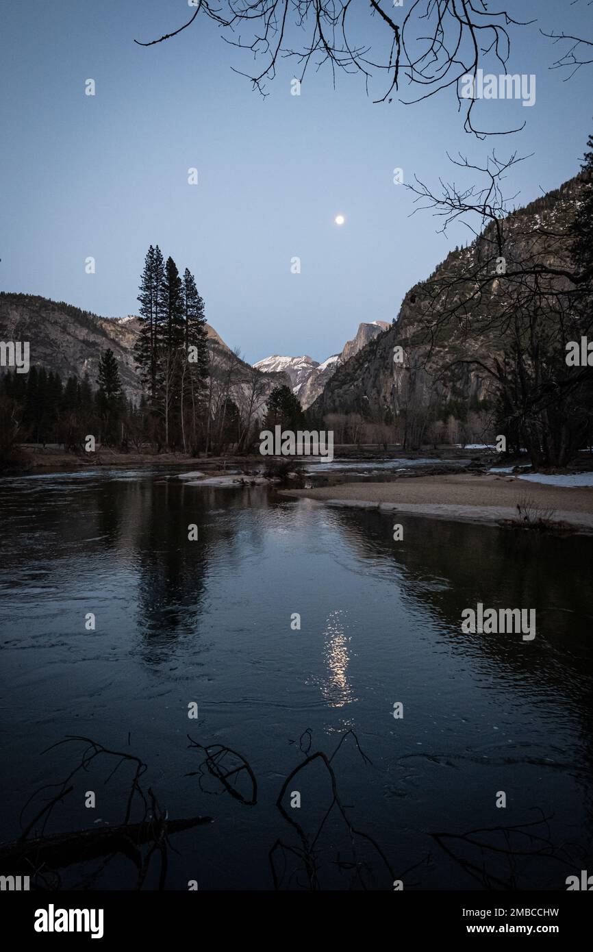 The full moon over Half Dome and Yosemite Valley at twilight Stock ...