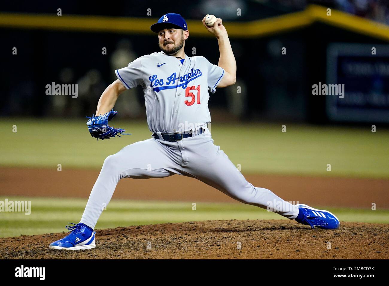 Los Angeles Dodgers relief pitcher Alex Vesia throws a pitch against ...