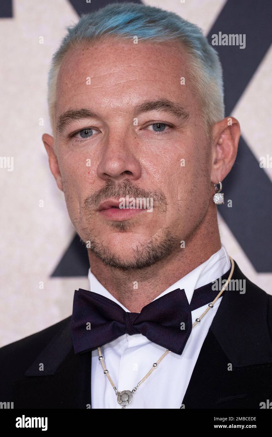 Diplo poses for photographers upon arrival at the amfAR Cinema Against ...