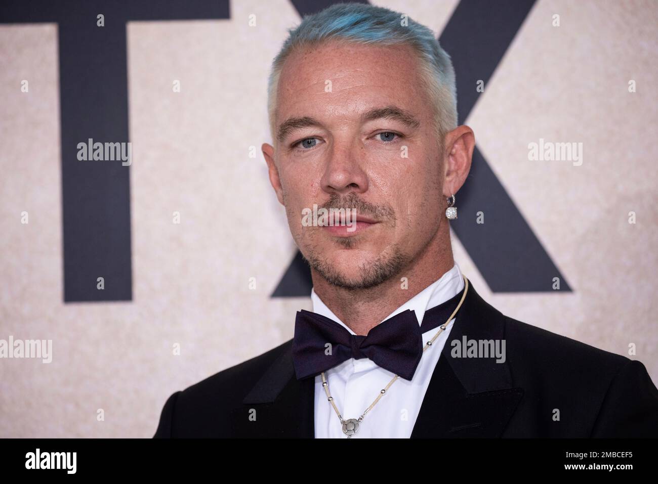 Diplo poses for photographers upon arrival at the amfAR Cinema Against ...