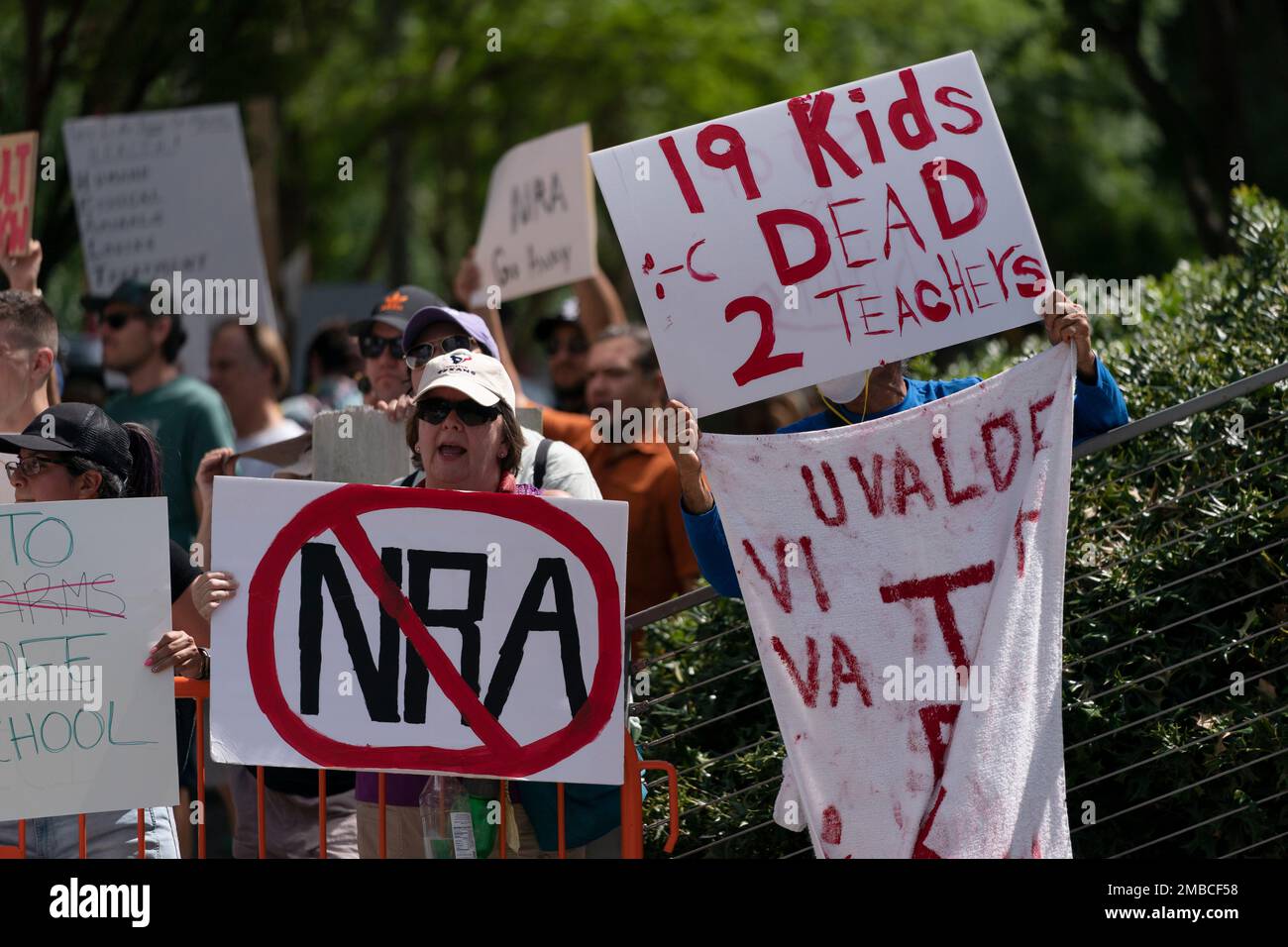 People protest the National Rifle Association's annual meeting in ...