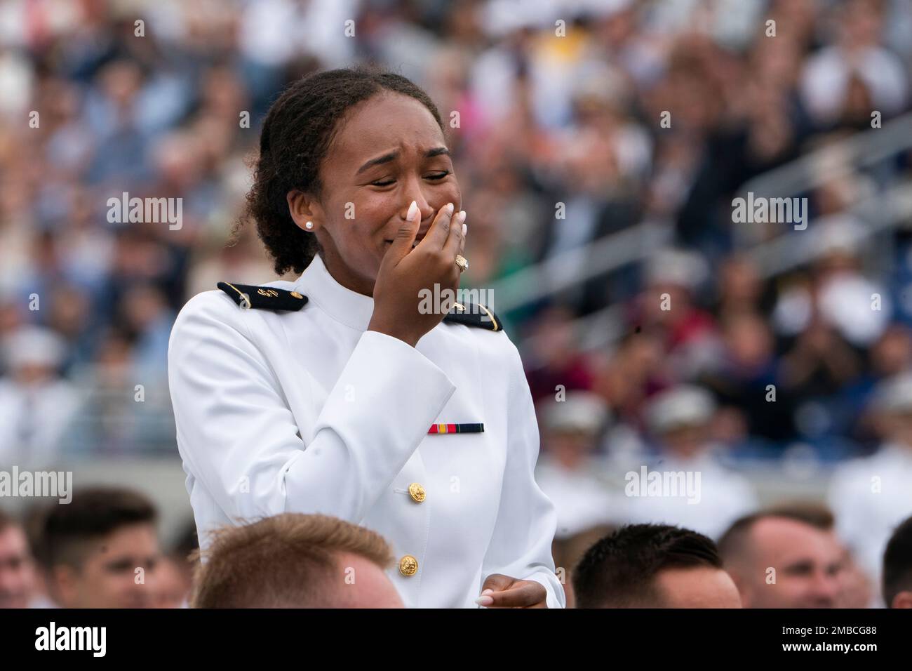 Midshipman Sarah Skinner, who is a Rhodes Scholar, reacts as President ...