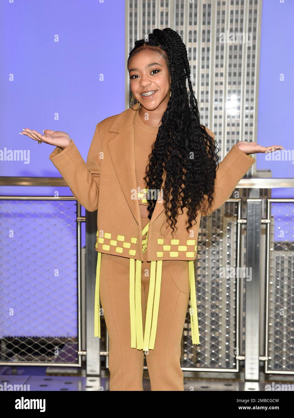 Actor Priah Ferguson participates in the ceremonial lighting of the ...