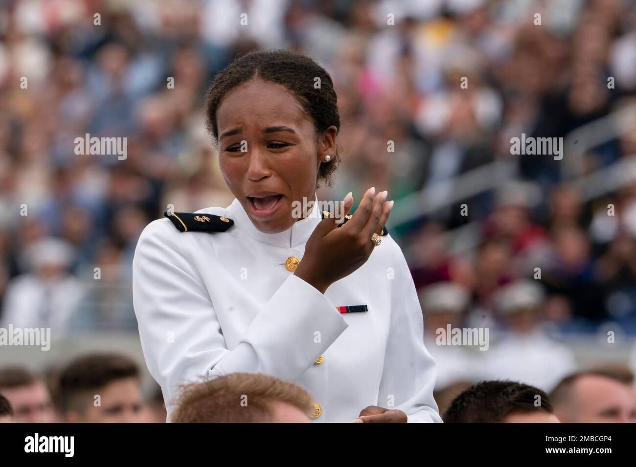Midshipman Sarah Skinner, who is a Rhodes Scholar, reacts as President ...