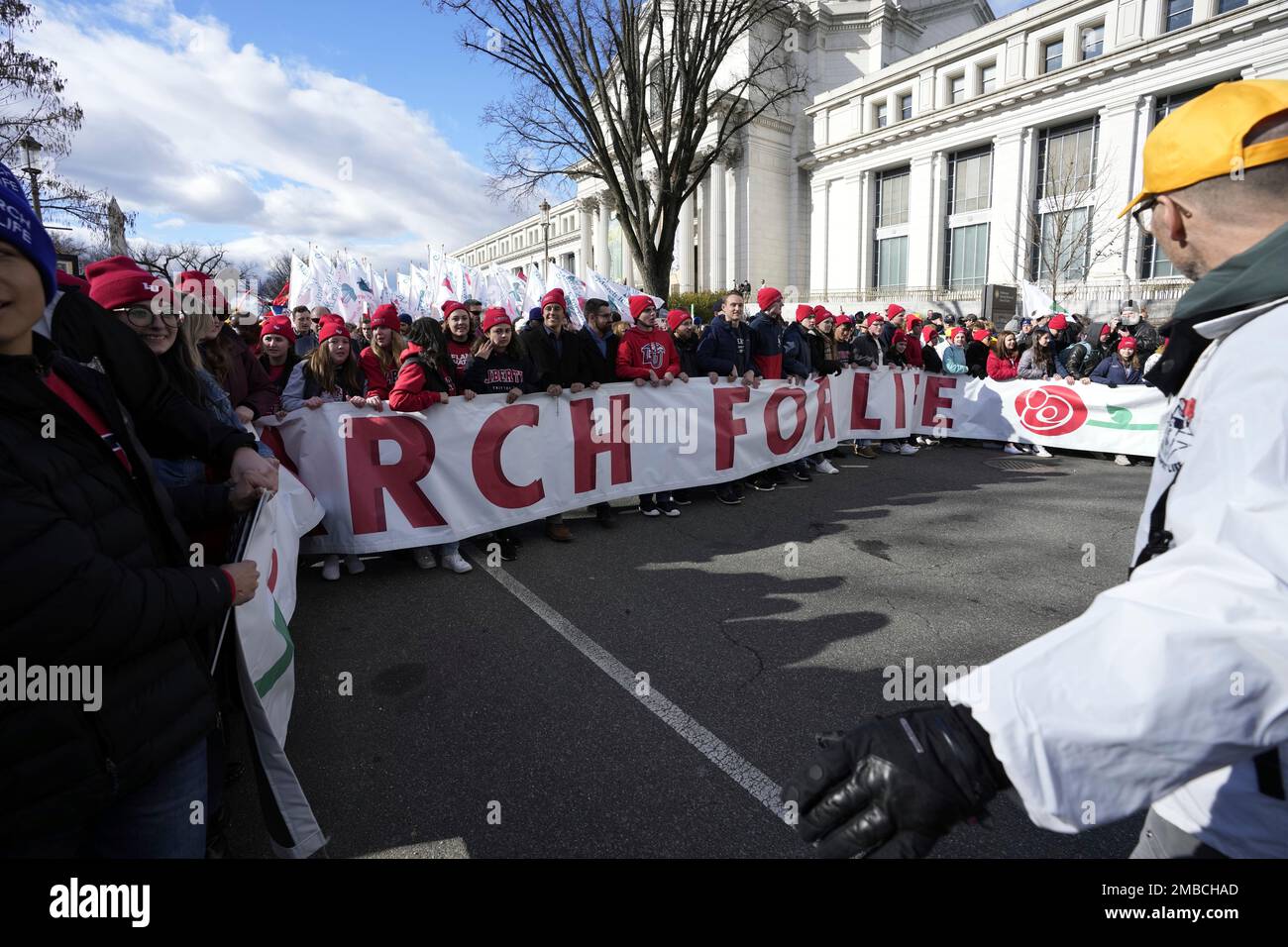 Anti-abortion demonstrators march toward the U.S. Supreme Court during ...