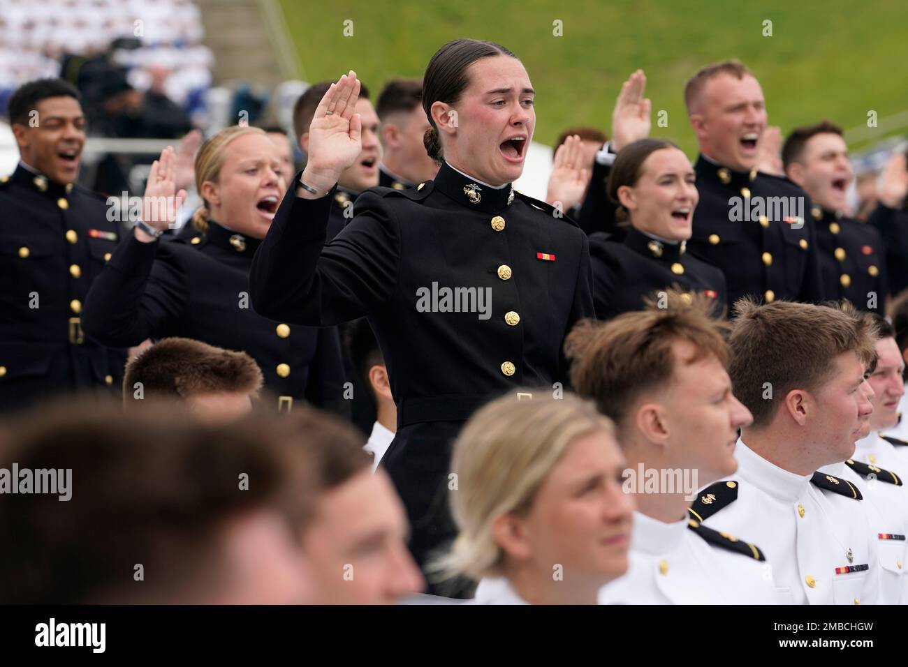 Graduating Marines take their oath during the U.S. Naval Academy's ...