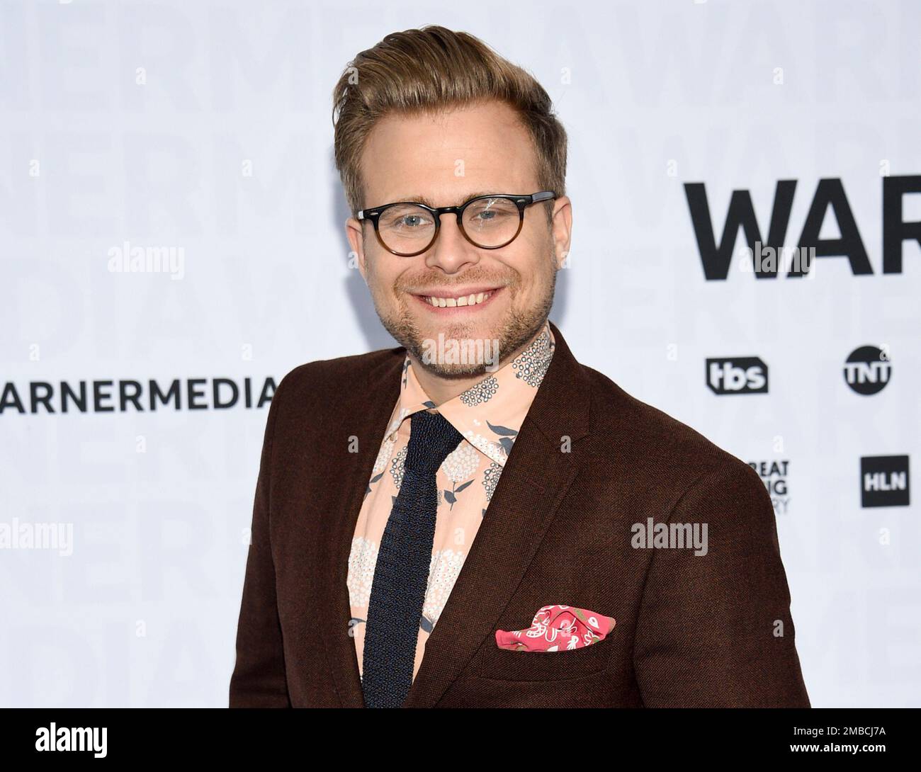 FILE - Adam Conover attends the WarnerMedia Upfront in New York on May ...