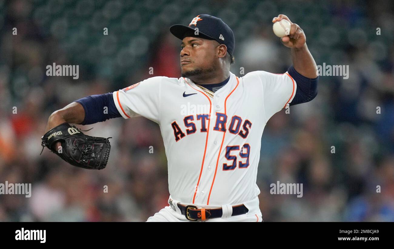 Houston Astros starting pitcher Framber Valdez (59) delivers during the first inning of the team ...