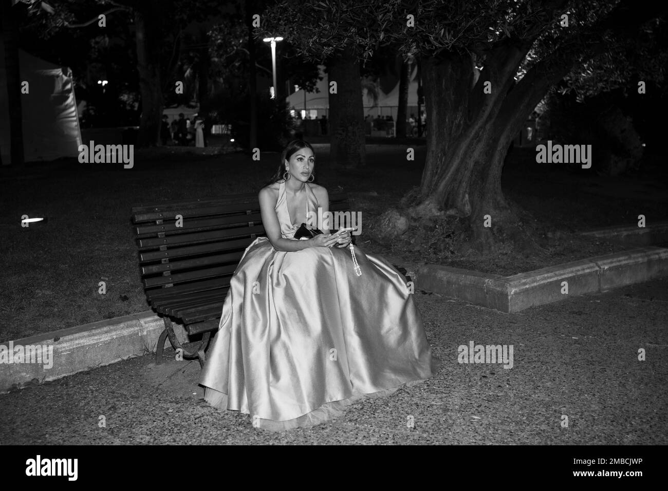 Maya Williams sits on a bench prior to walking the red carpet during ...