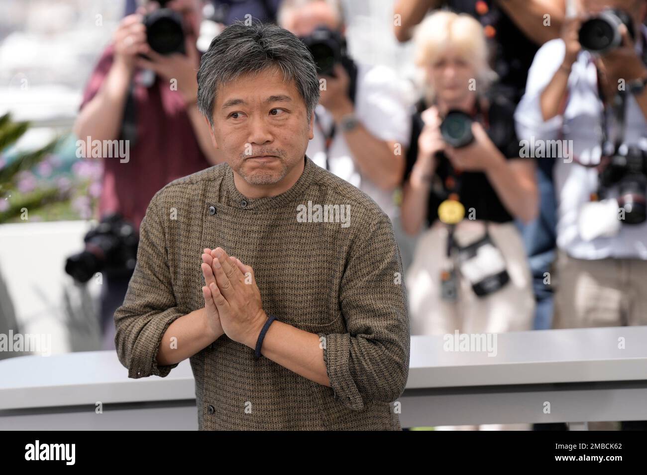 Director Hirokazu Koreeda poses for photographers at the photo call for ...