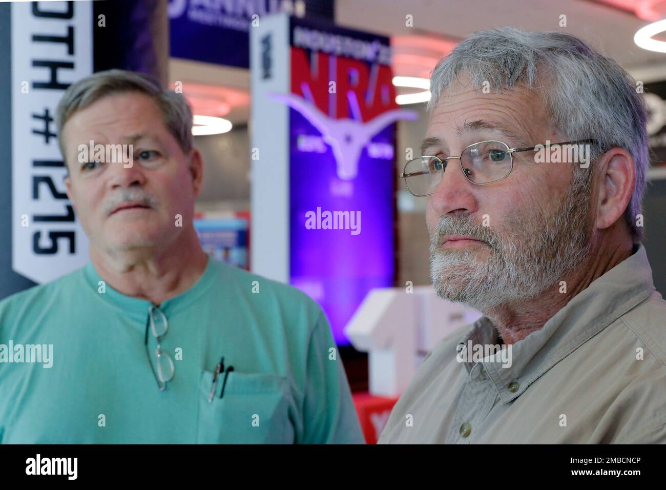 Convention attendees Frank Cortez, left, and his older brother Kent ...