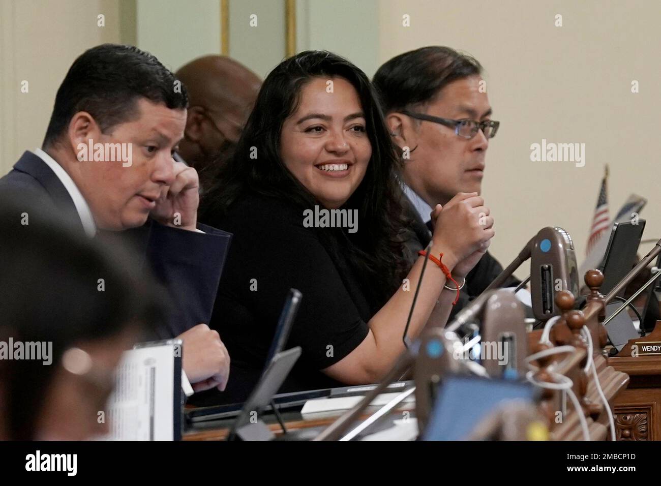 Assemblymember Wendy Carrillo, D-Los Angeles, center, smiles after her ...