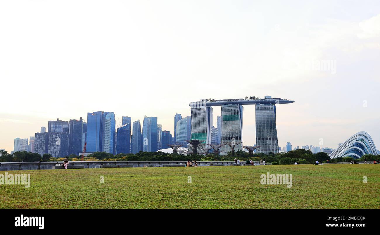 city skyline view from Marina Barrage, with beautiful blue sky and ...