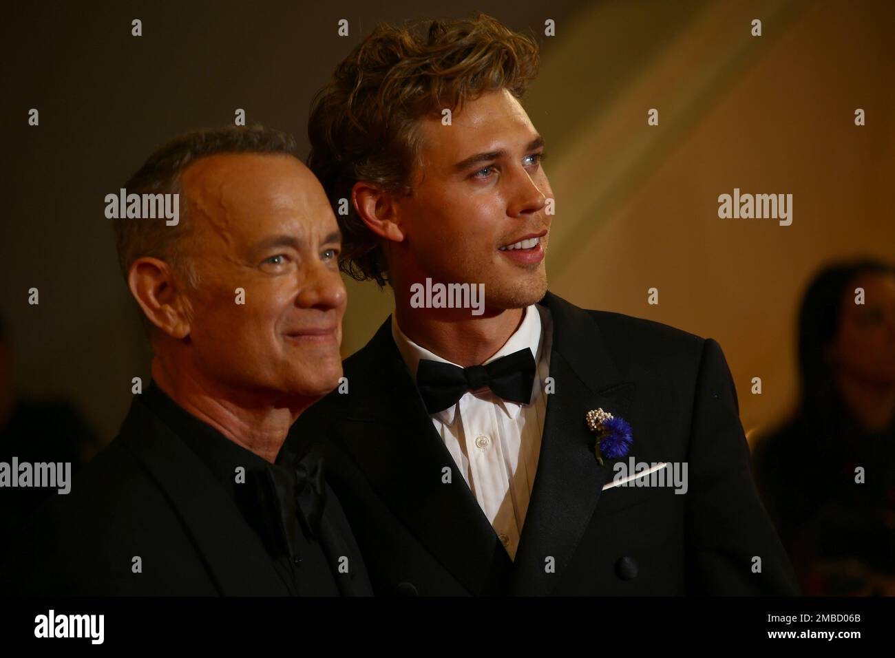 Tom Hanks, left, and Austin Butler pose for photographers upon ...