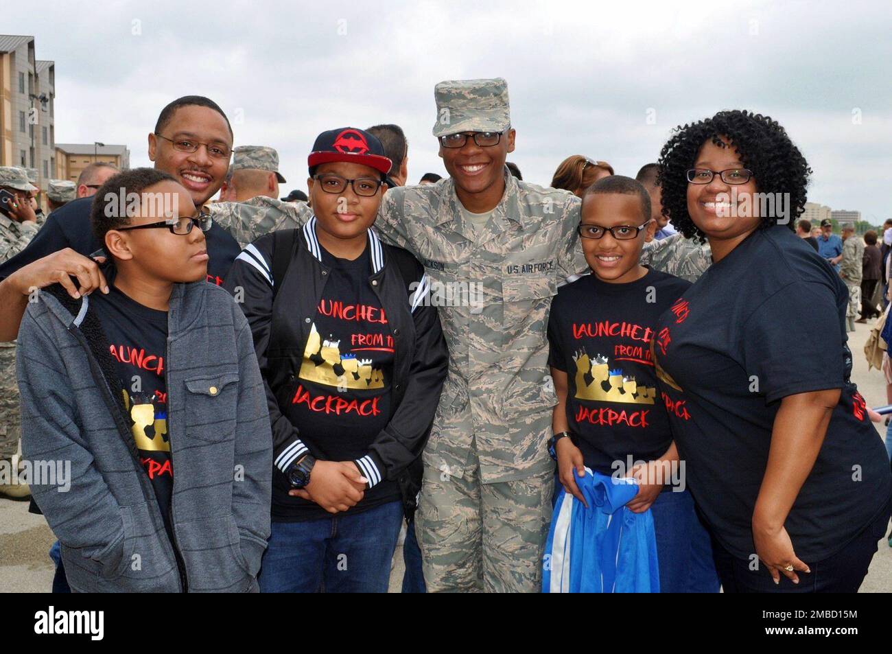 Master Sgt. Clifford Jackson III (rear left), and his family celebrate ...