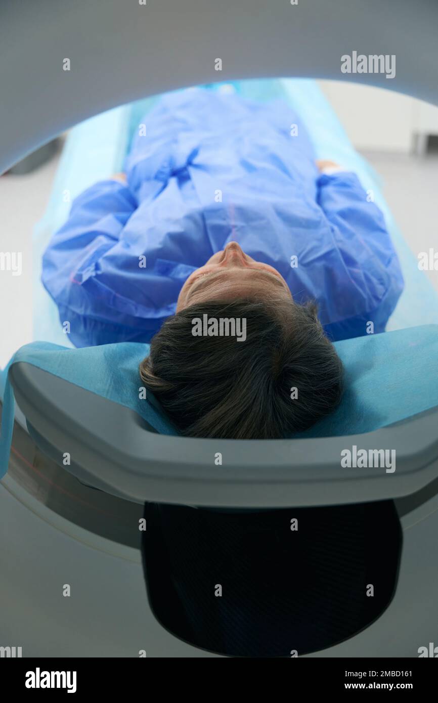 Woman is in the chamber of a modern MRI machine Stock Photo - Alamy