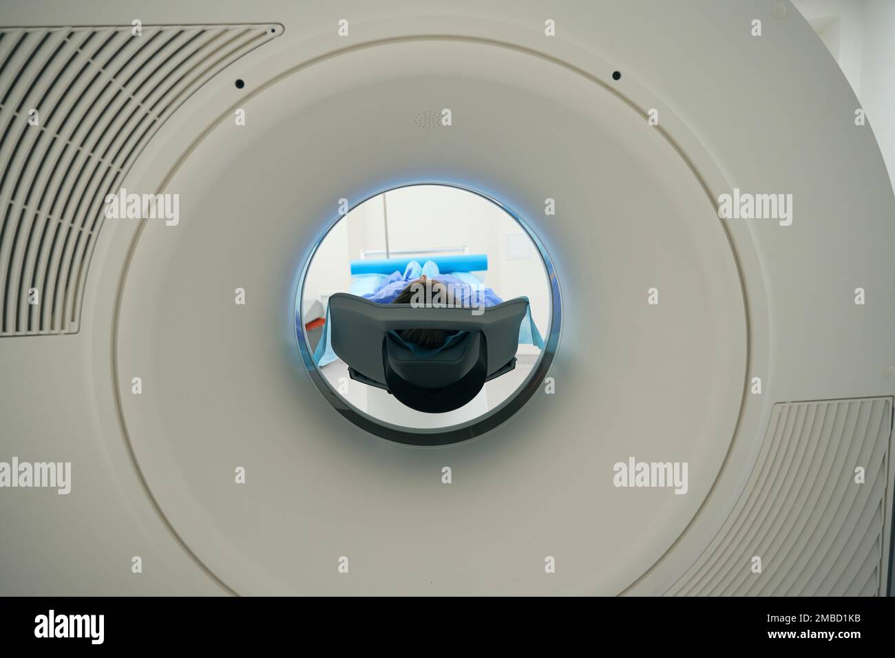 Patient is placed in the chamber of modern MRI machine Stock Photo - Alamy