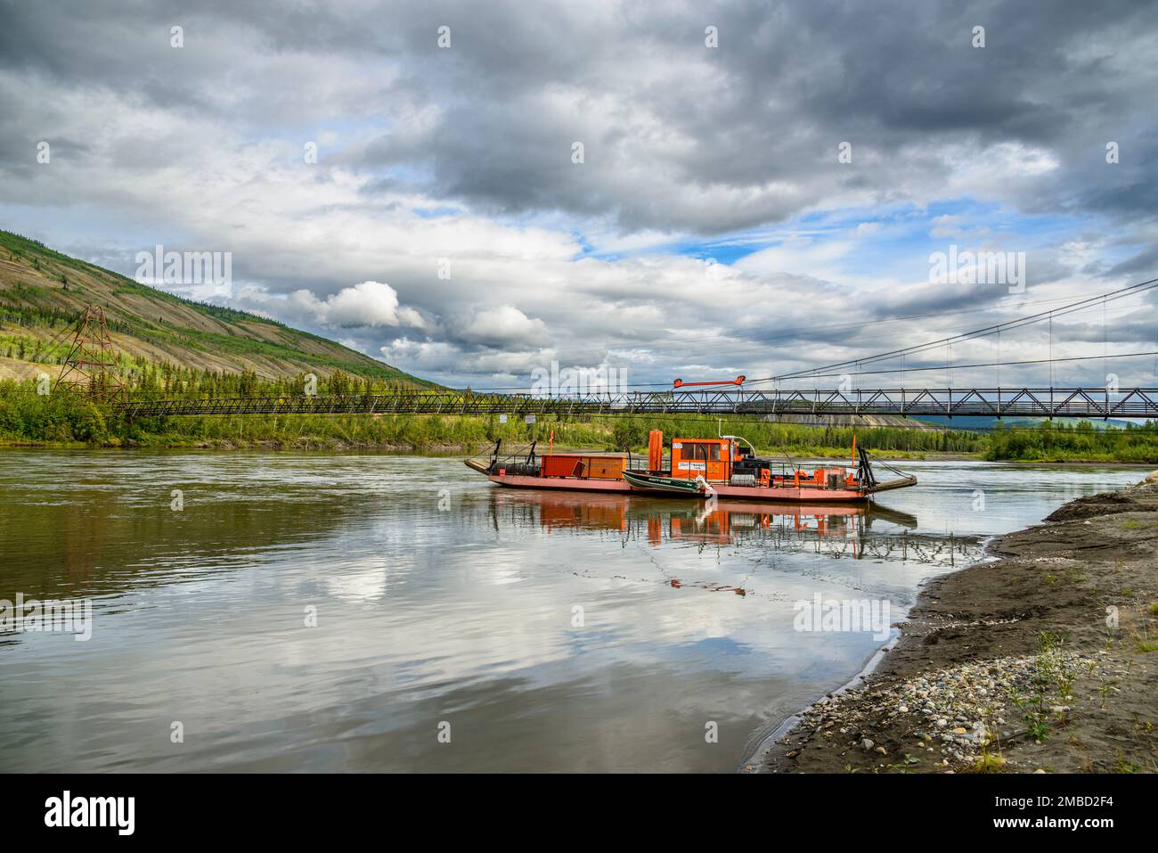 The Pelly Barge cable ferry crossing the Pelly River at Ross River ...