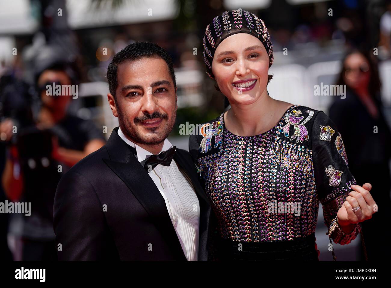 Navid Mohammadzadeh, left, and Fereshteh Hosseini pose for photographers upon arrival at the ...