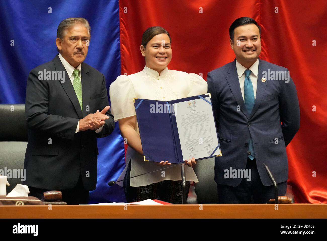 Vice-president-elect Sara Duterte, center, poses with Senate President ...