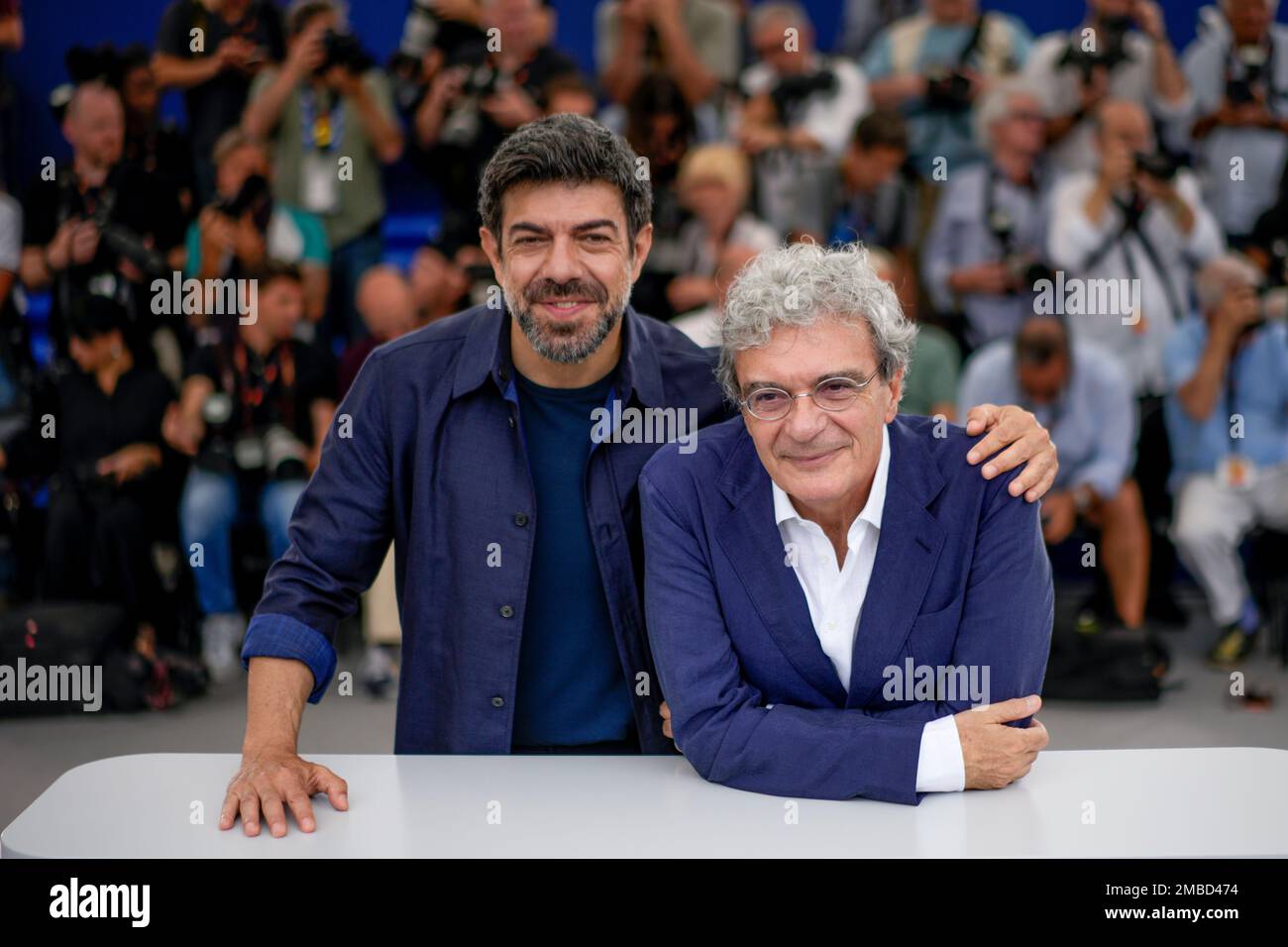 Pierfrancesco Favino, from left, and director Mario Martone pose for ...