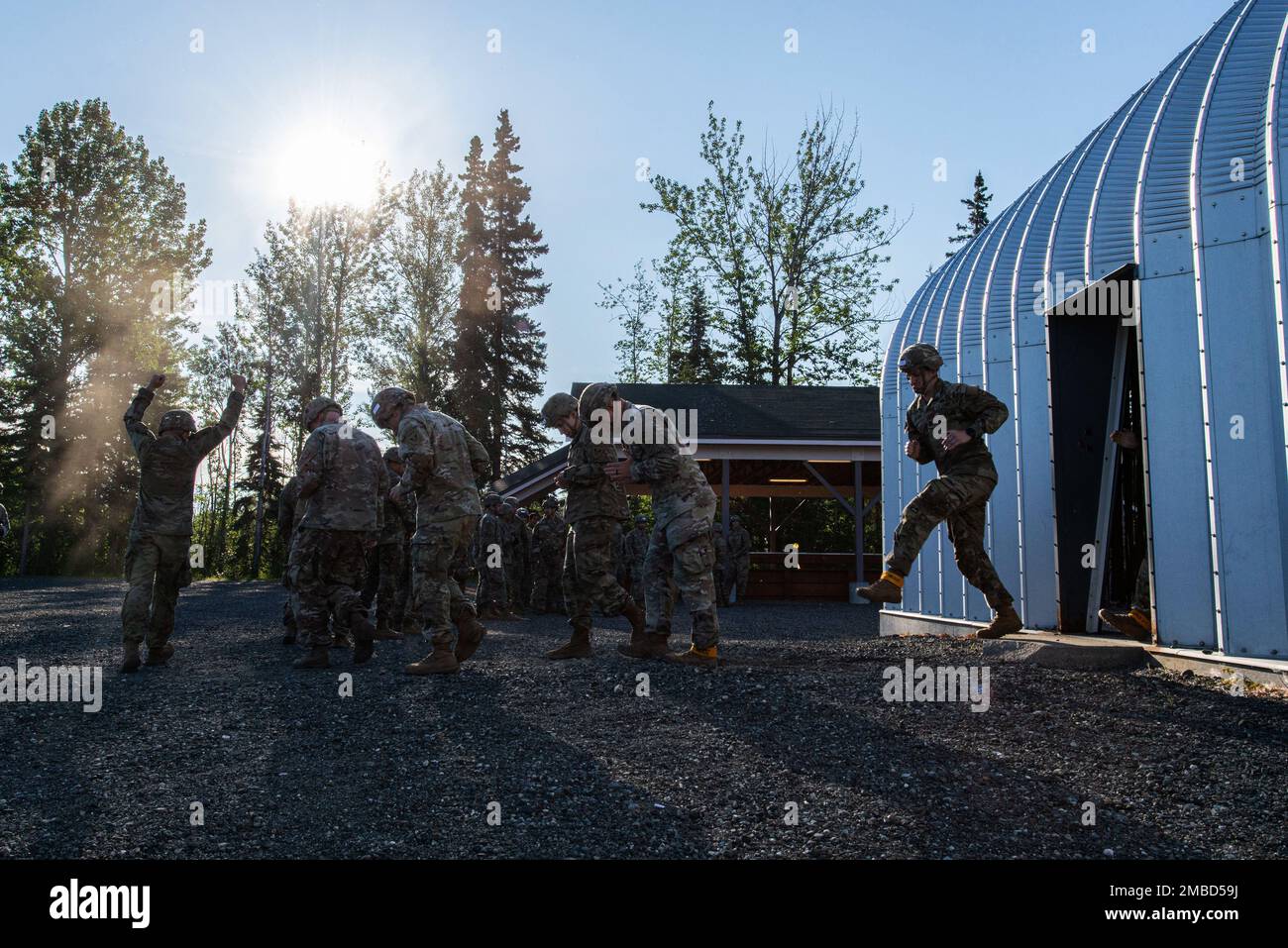 U.S. Army Soldiers and U.S. Air Force Airmen practice parachute landing ...