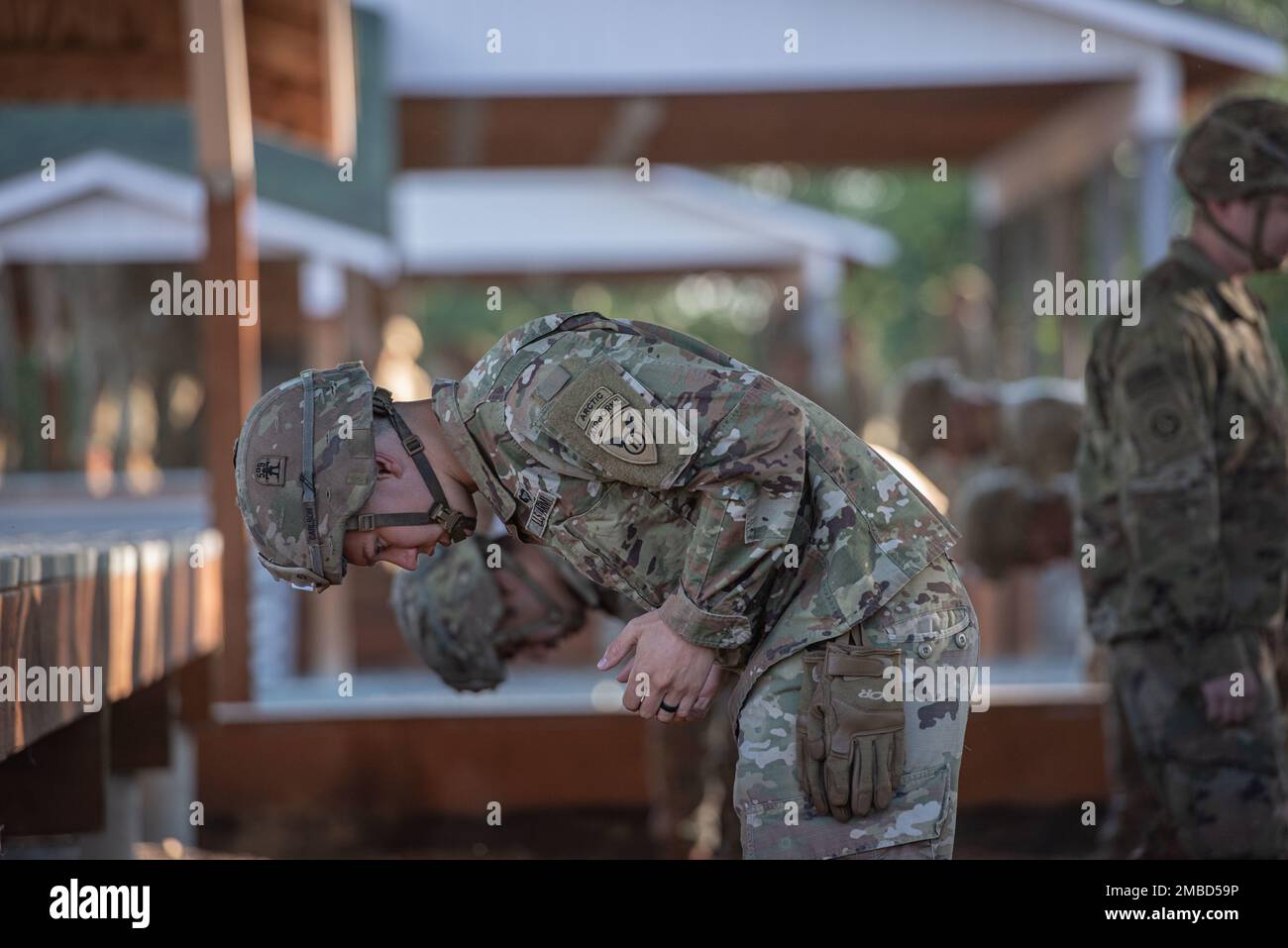 U.S. Army Soldiers and U.S. Air Force Airmen practice parachute landing ...