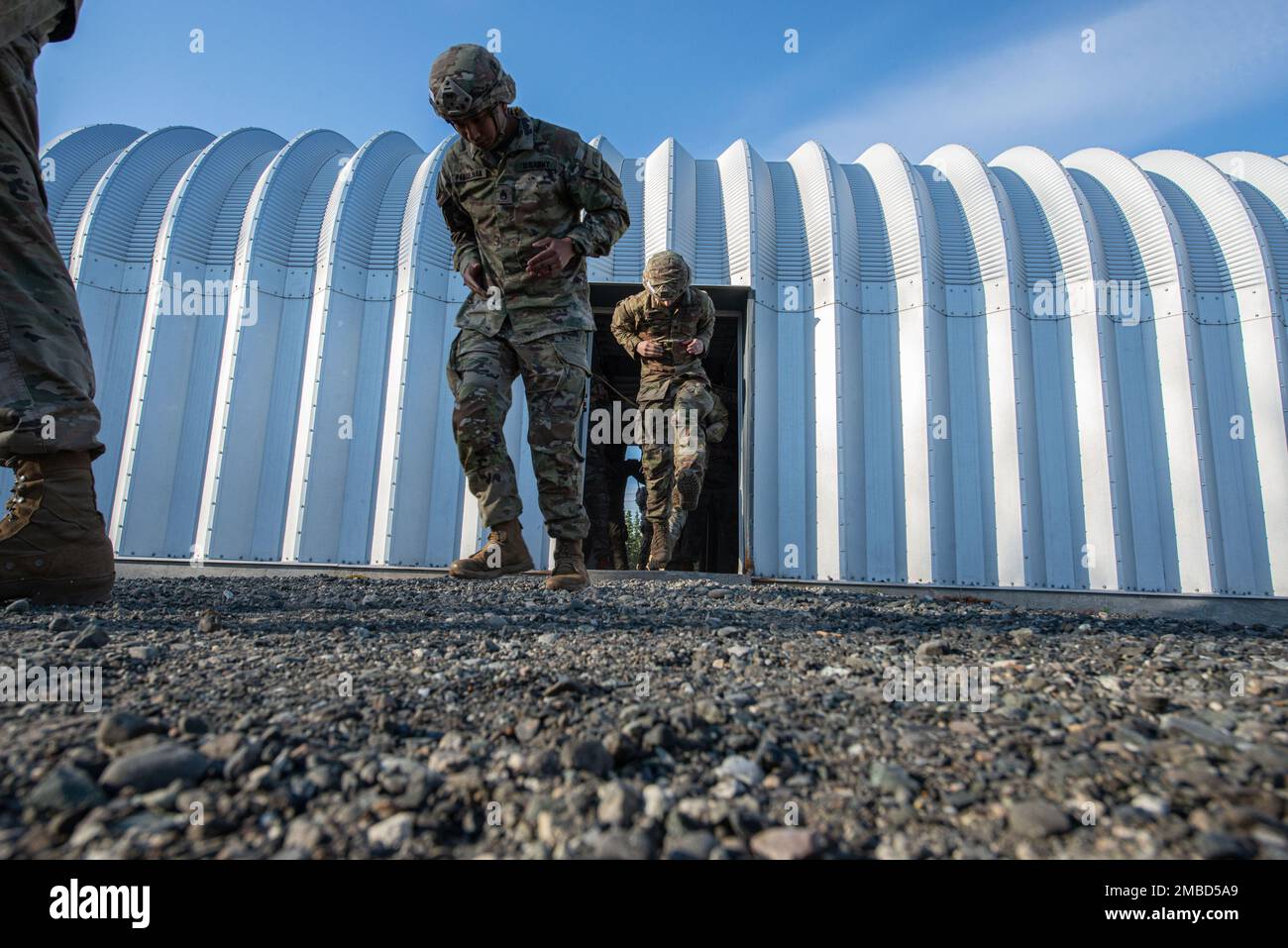 U.S. Army Soldiers and U.S. Air Force Airmen practice parachute landing ...