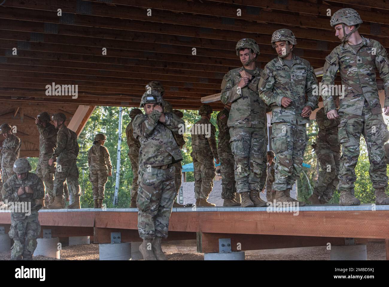 U.S. Army Soldiers and U.S. Air Force Airmen practice parachute landing ...