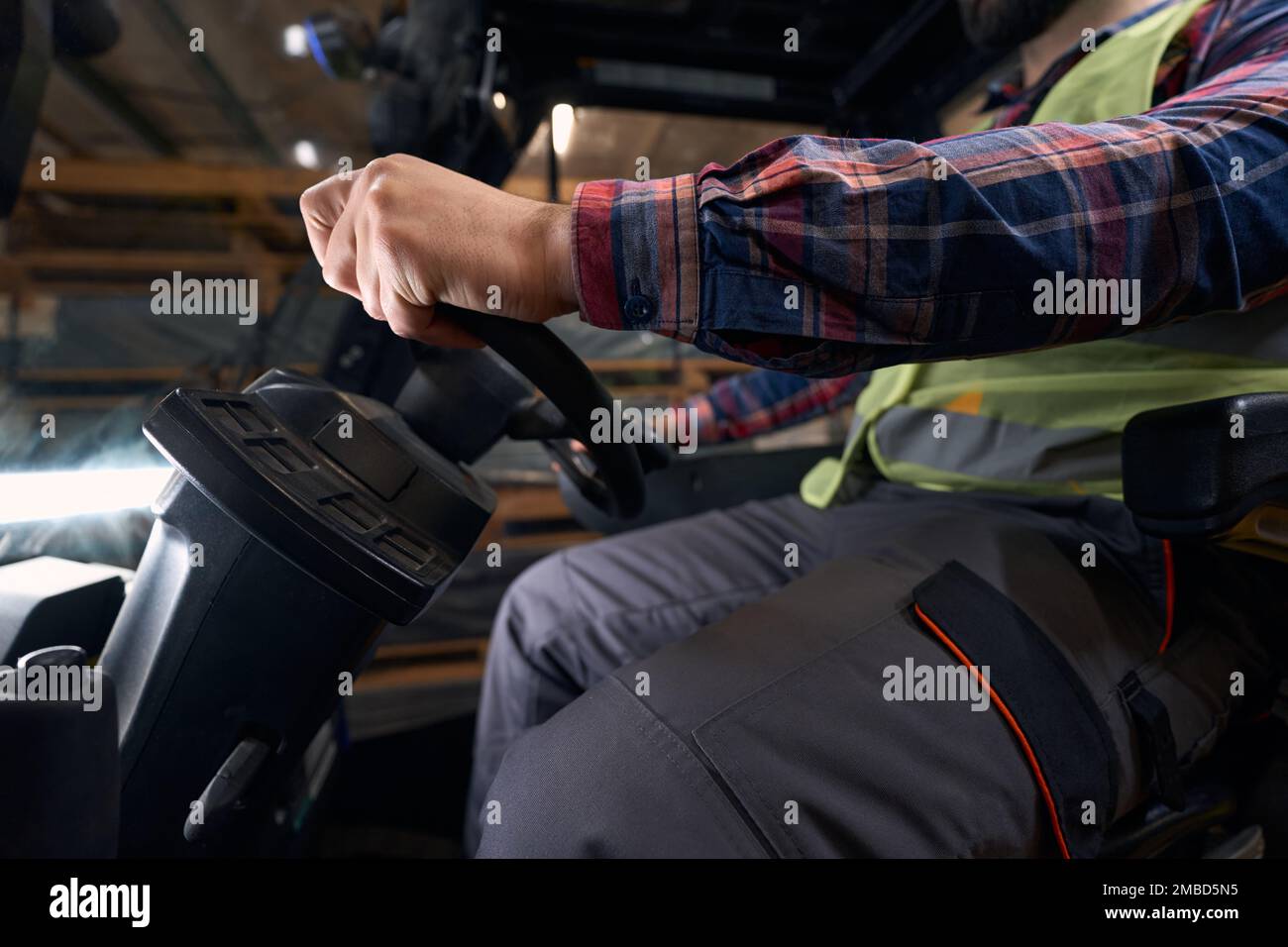 Close-up photo of man driving car at work Stock Photo - Alamy