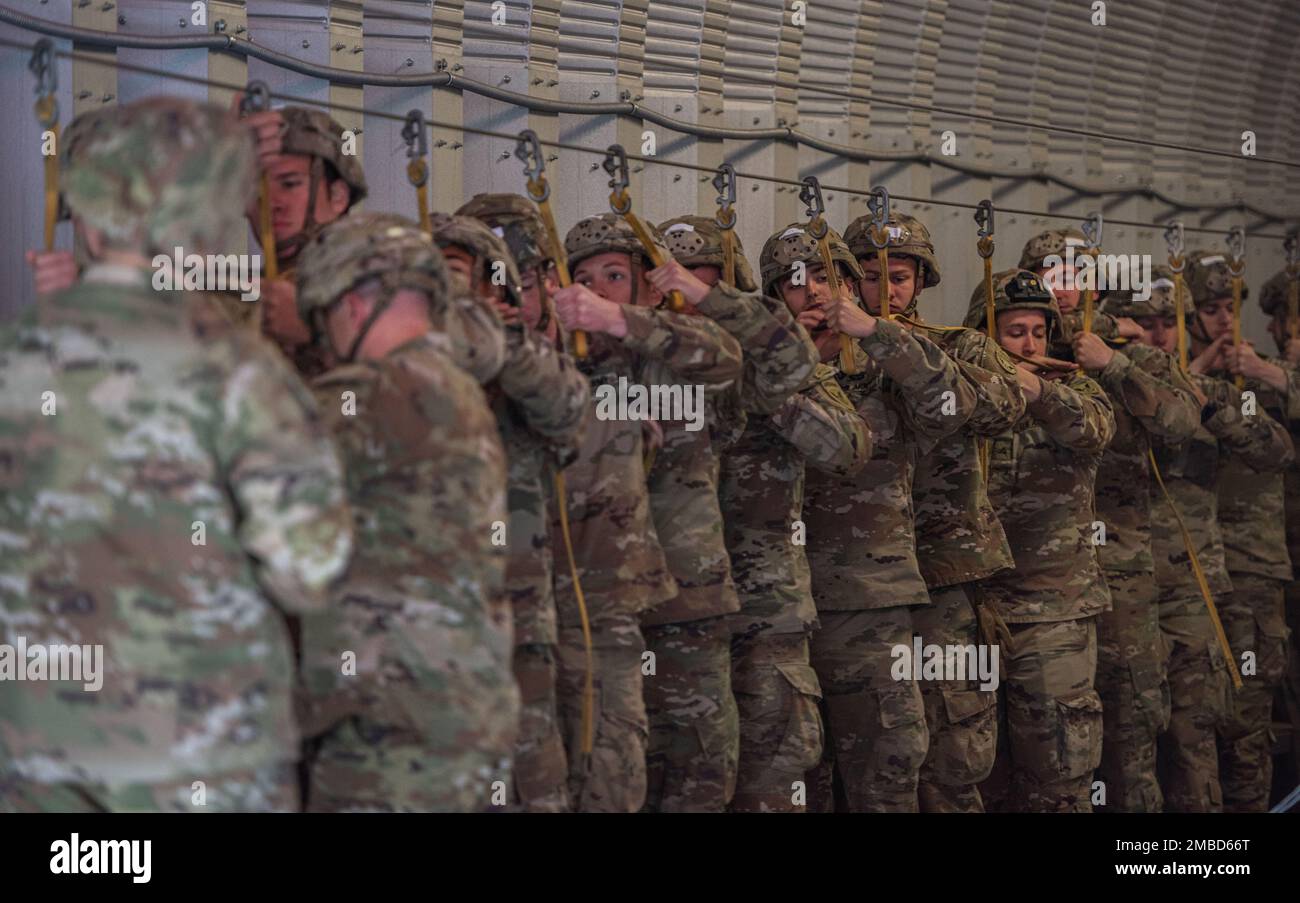 U.S. Army Soldiers and U.S. Air Force Airmen practice parachute landing ...
